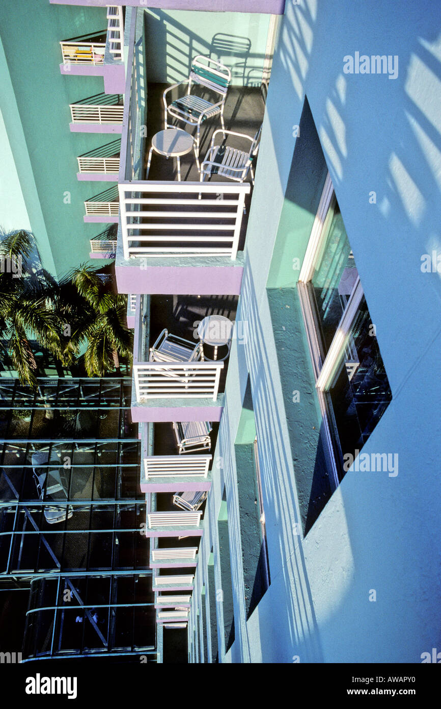 Exterior view of a hotel from an upper balcony, featuring tropical ...