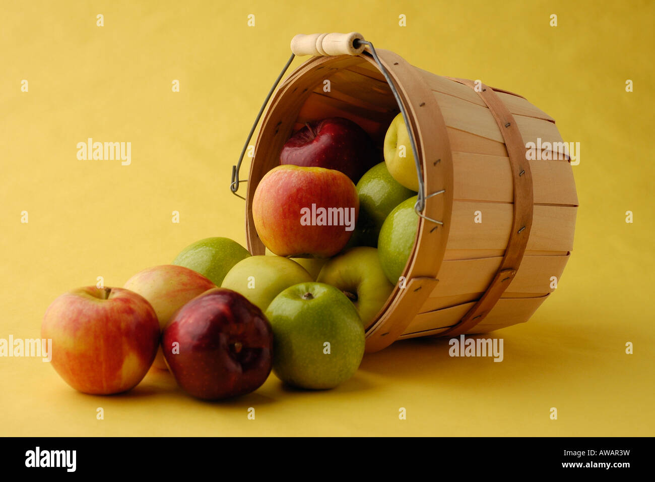A bucket overflowing with apples Stock Photo - Alamy