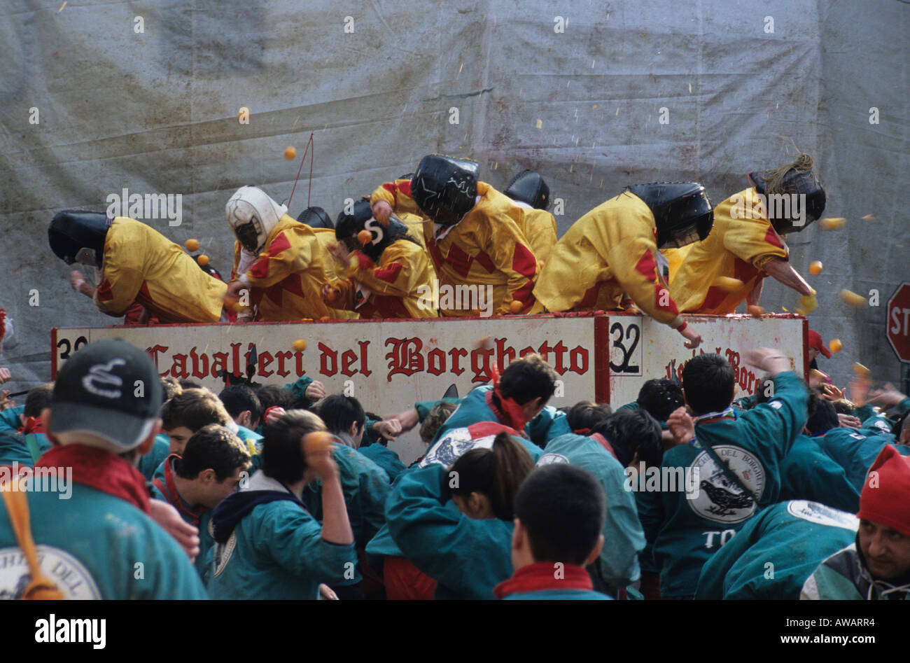 Orange battle at the carnival of Ivrea, Italy Stock Photo - Alamy