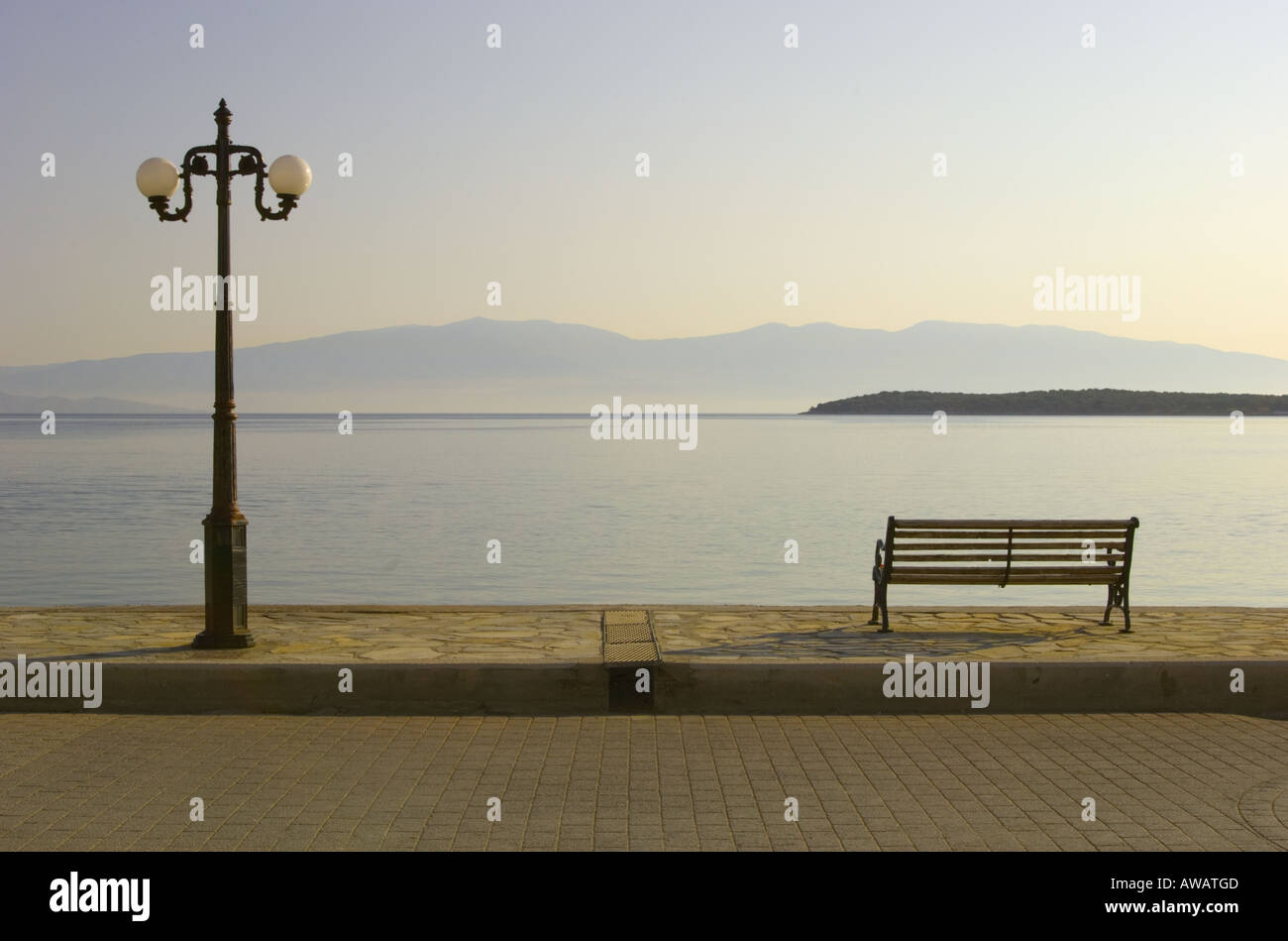 The waterfront in a small Greek village Stock Photo - Alamy
