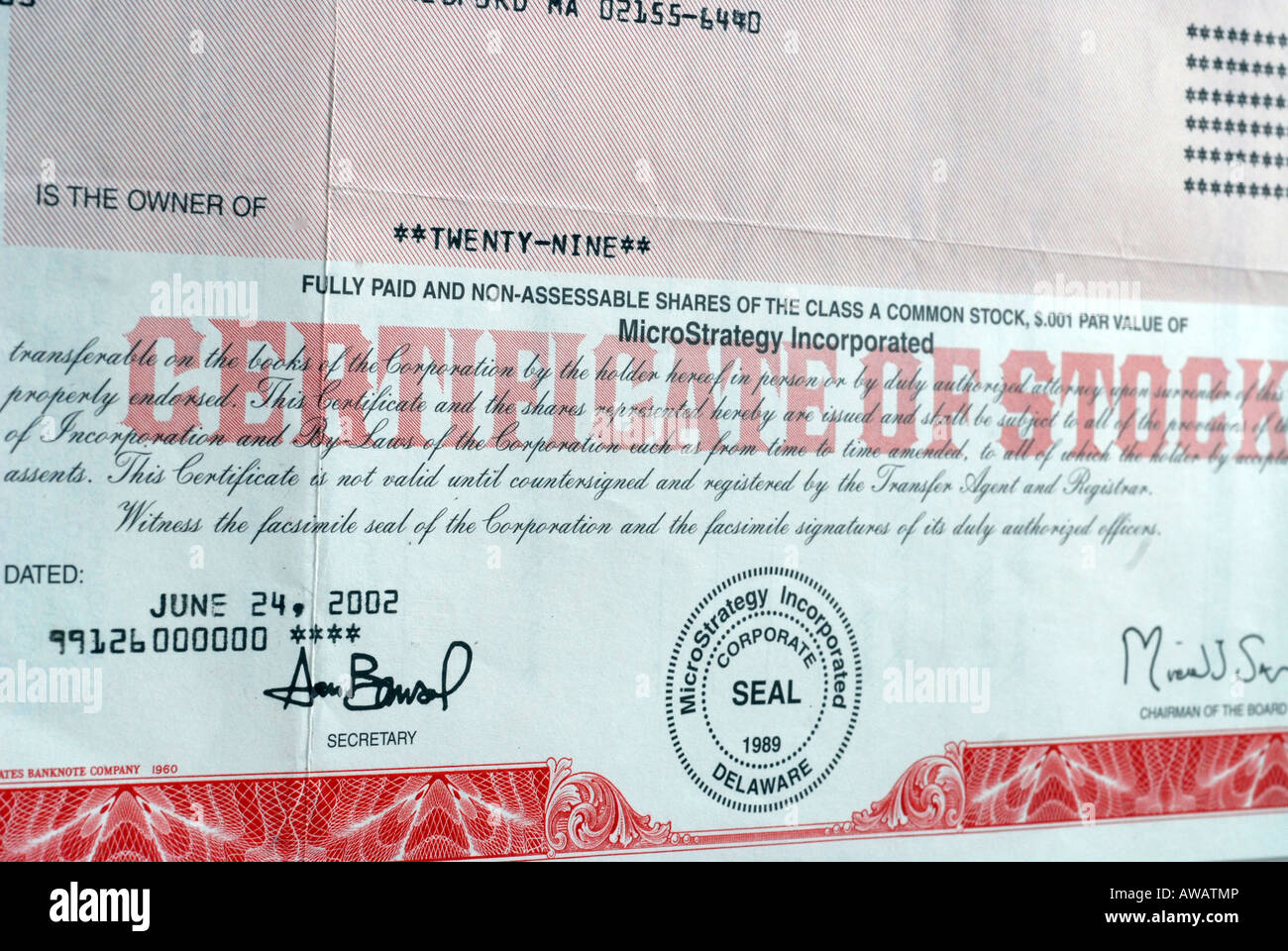 Miscrostrategies stock certificate on white background (closeup Stock ...
