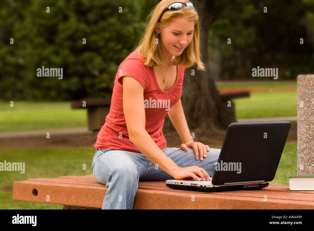 Young blonde female college student studying on campus Stock Photo - Alamy