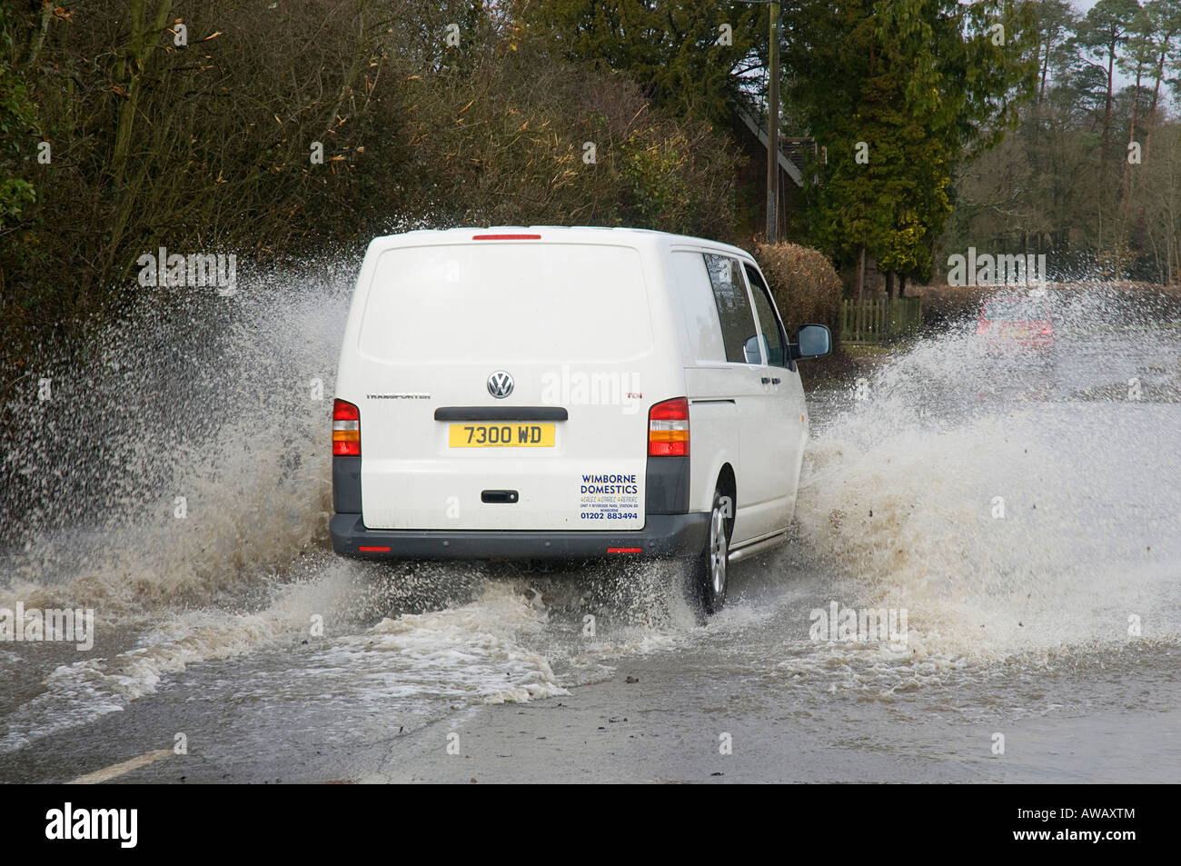 White van driving through water hi-res stock photography and images - Alamy