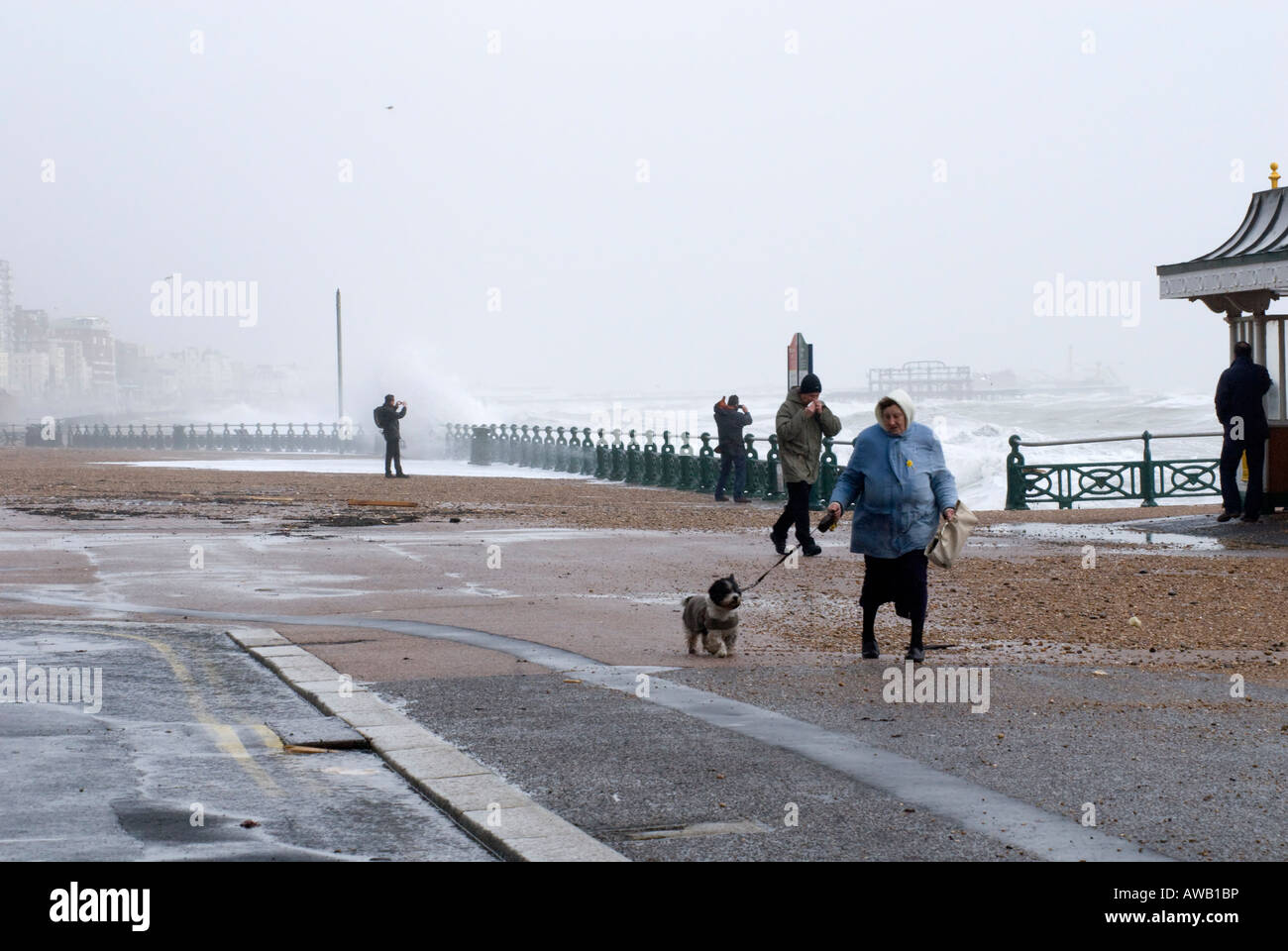 Walkers Stormy seafront Stock Photo - Alamy