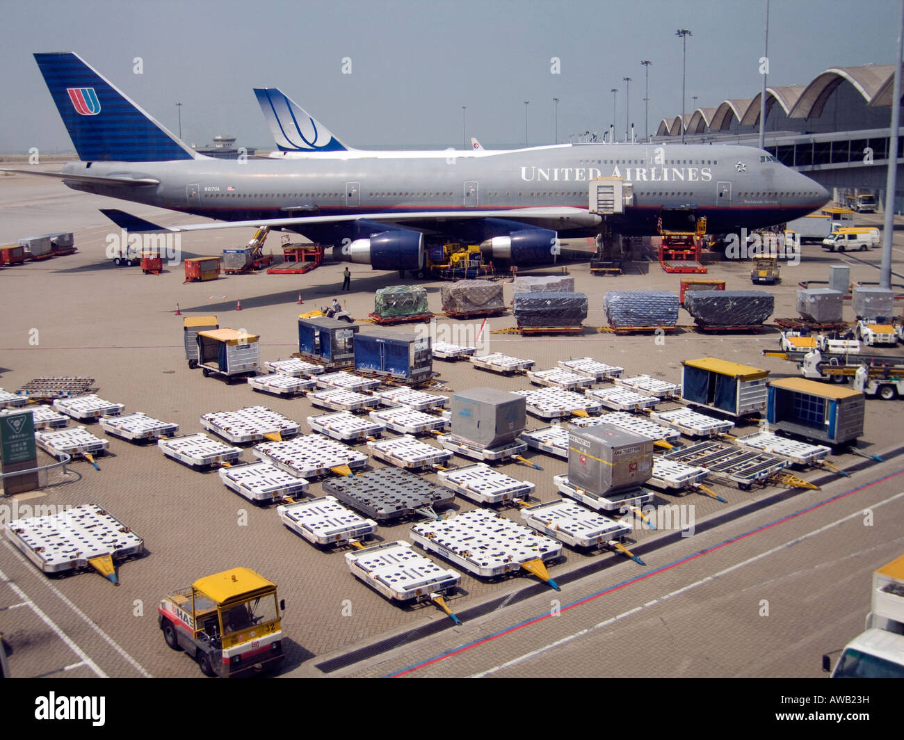 A commercial airplane docked at Hong Kong's Chek Lap Kok International ...