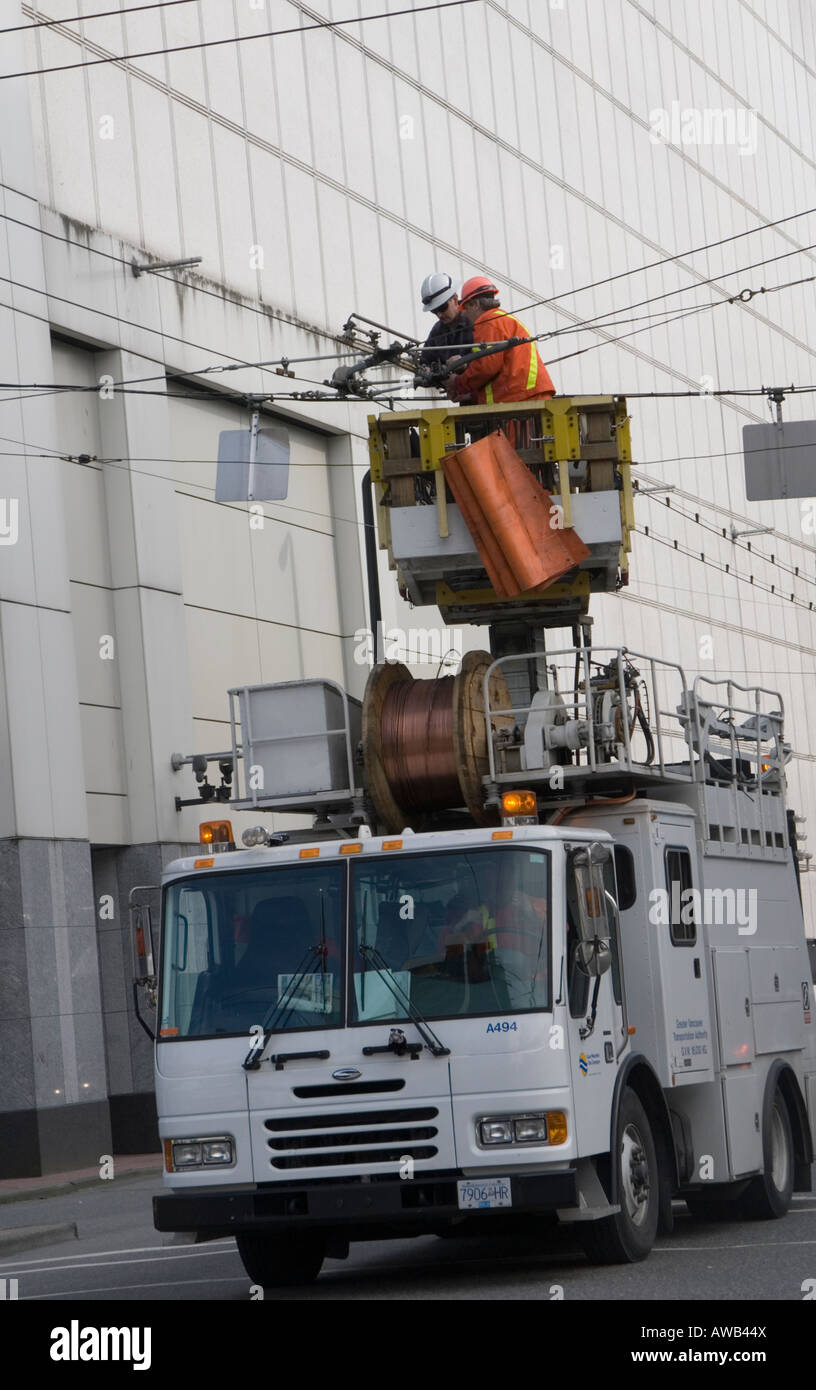 Hydro worker working on lines in downtown Vancouver, British Columbia ...