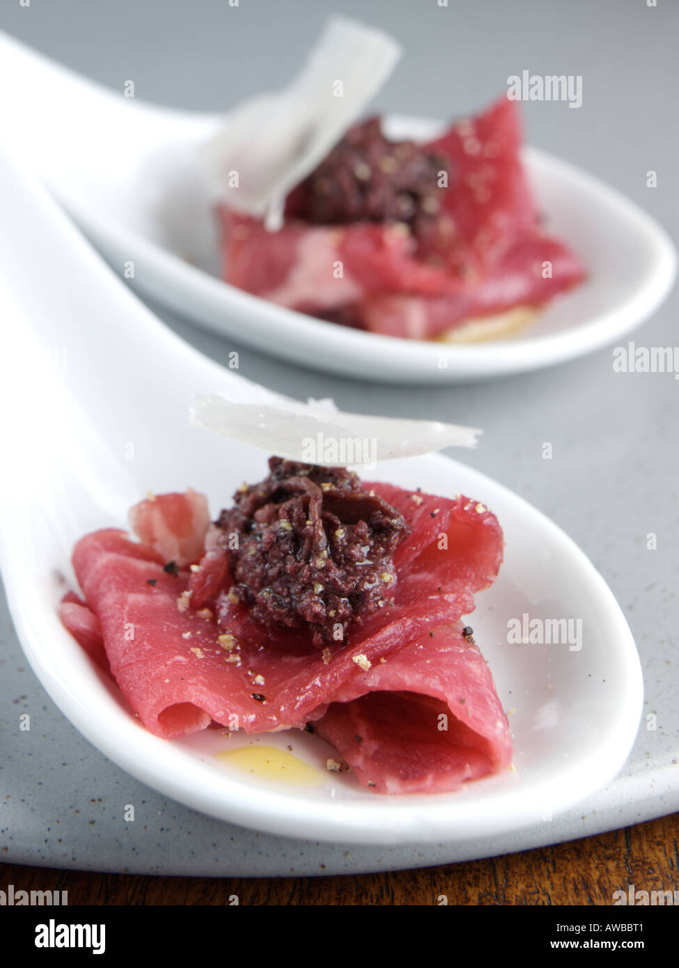 Italian carpaccio canapes parmesan shaving raw beef filet hi-res stock ...