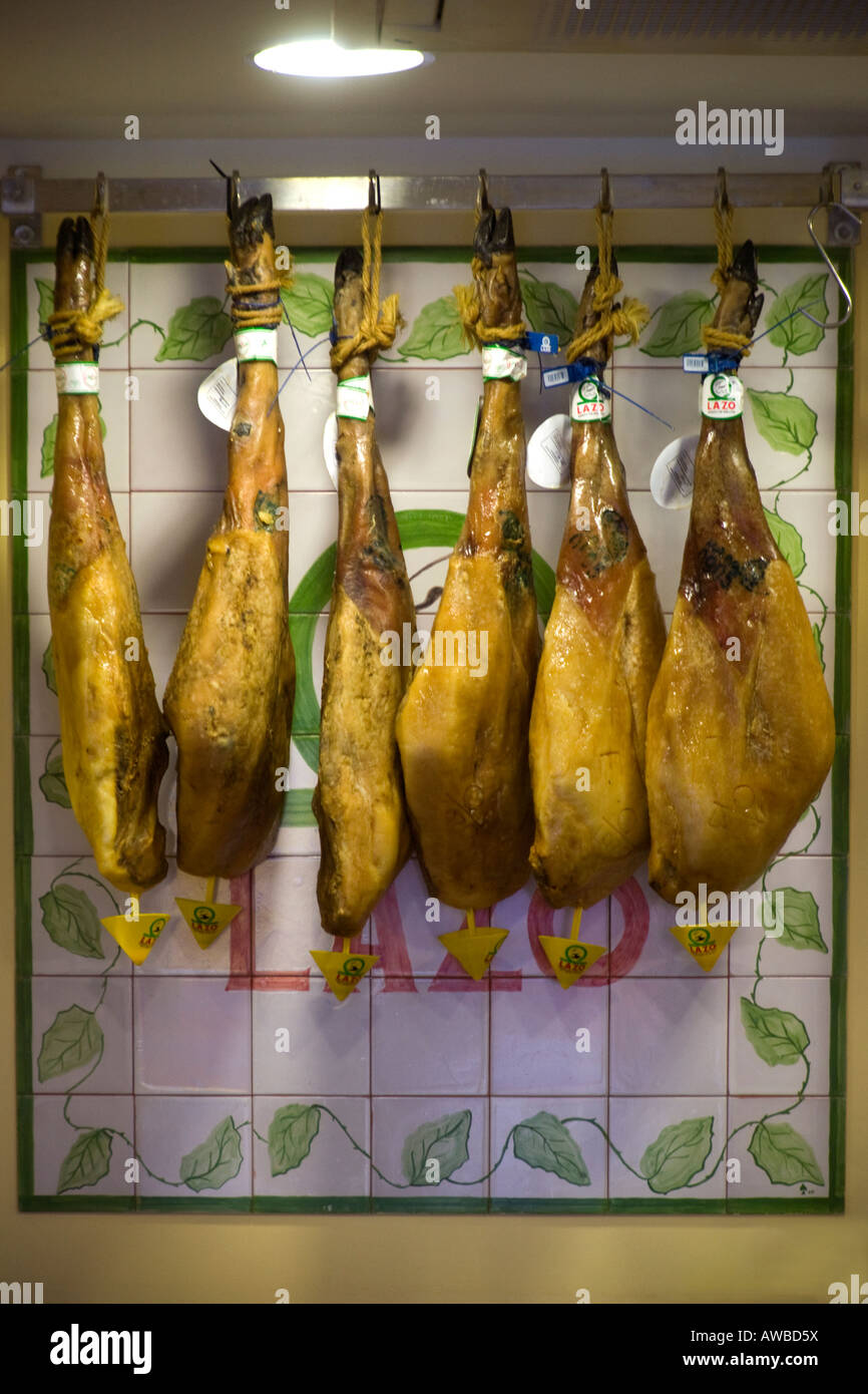 Cured ham hanging in restaurant hi-res stock photography and images - Alamy