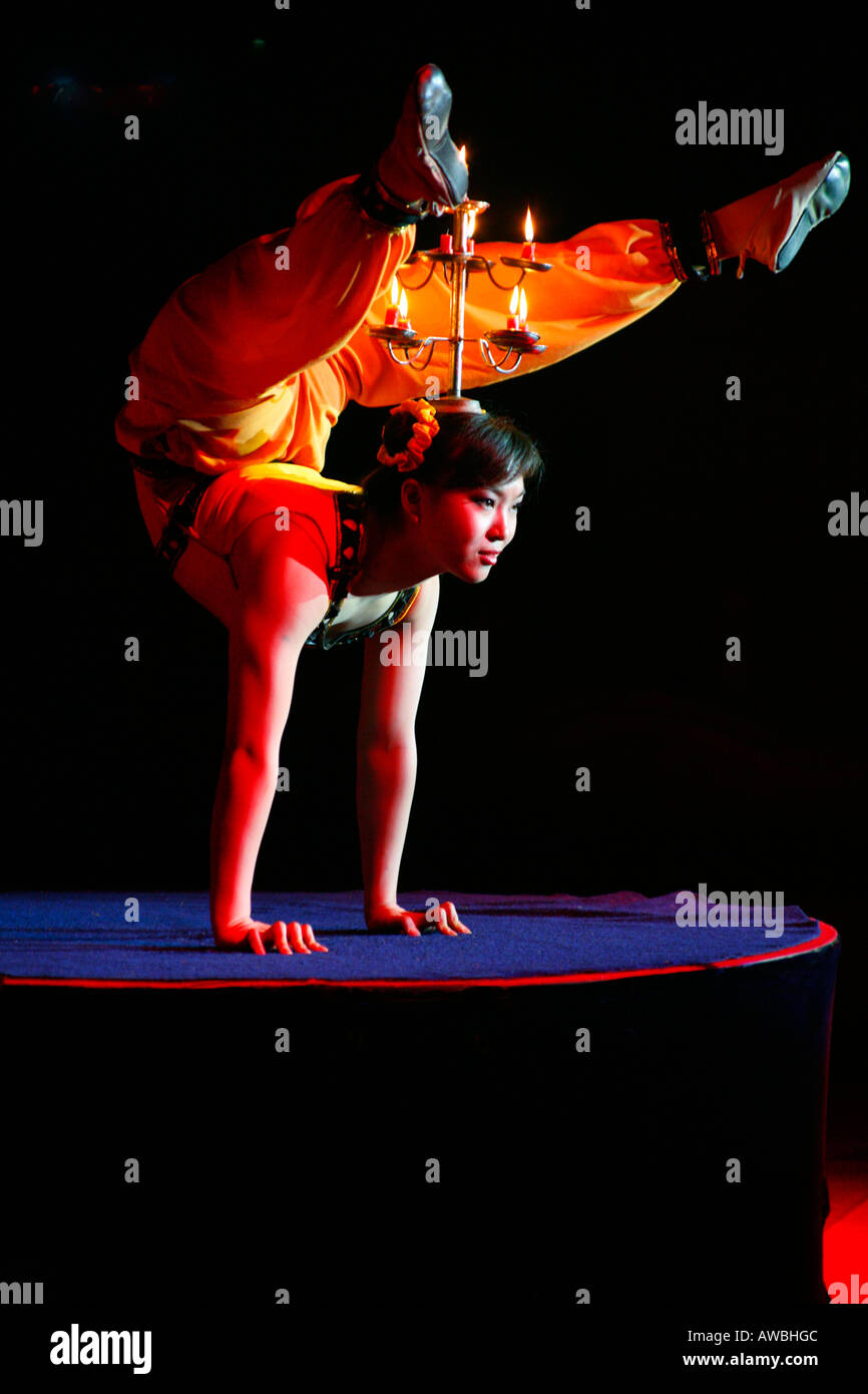 Orange and gold outfit hi-res stock photography and images - Alamy