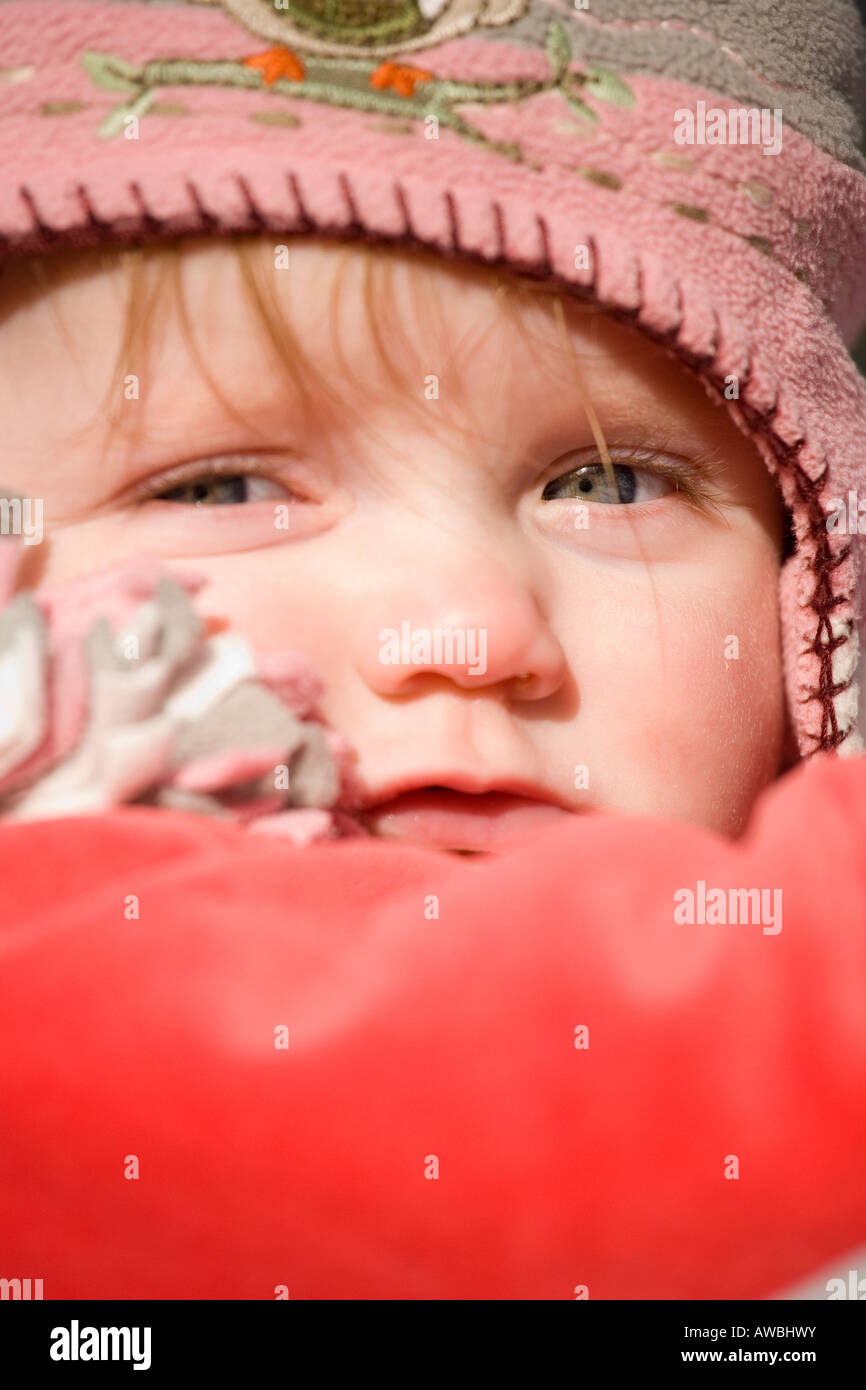 Baby girl wrapped up warm for winter Stock Photo - Alamy
