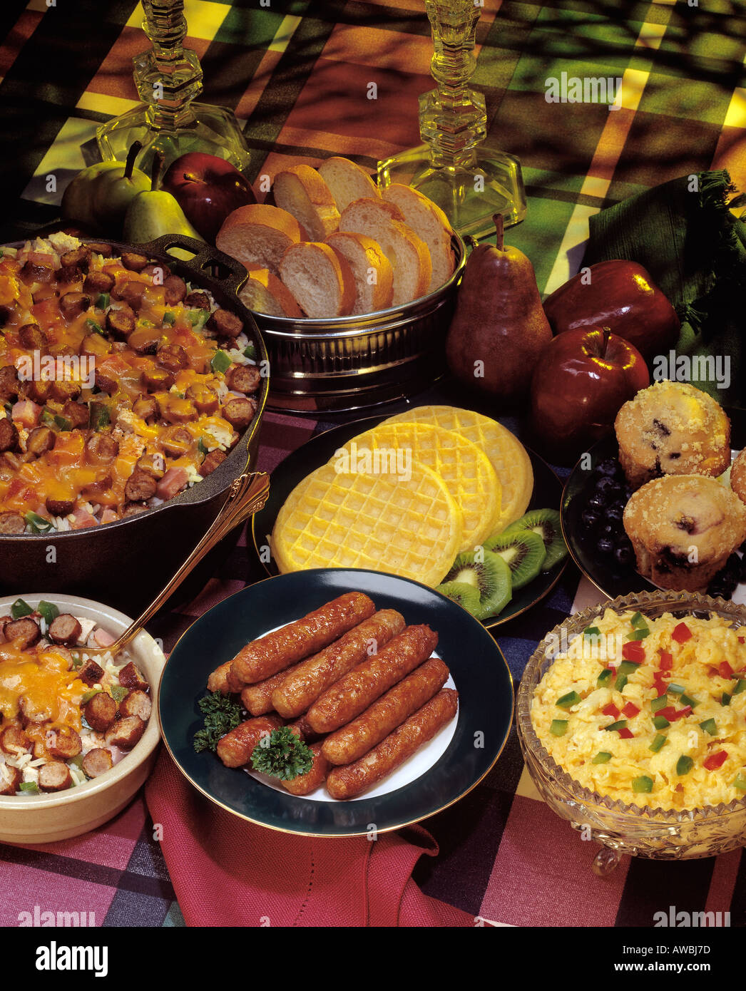 assortment breakfast items waffles sausage hash brown potato scrambled ...