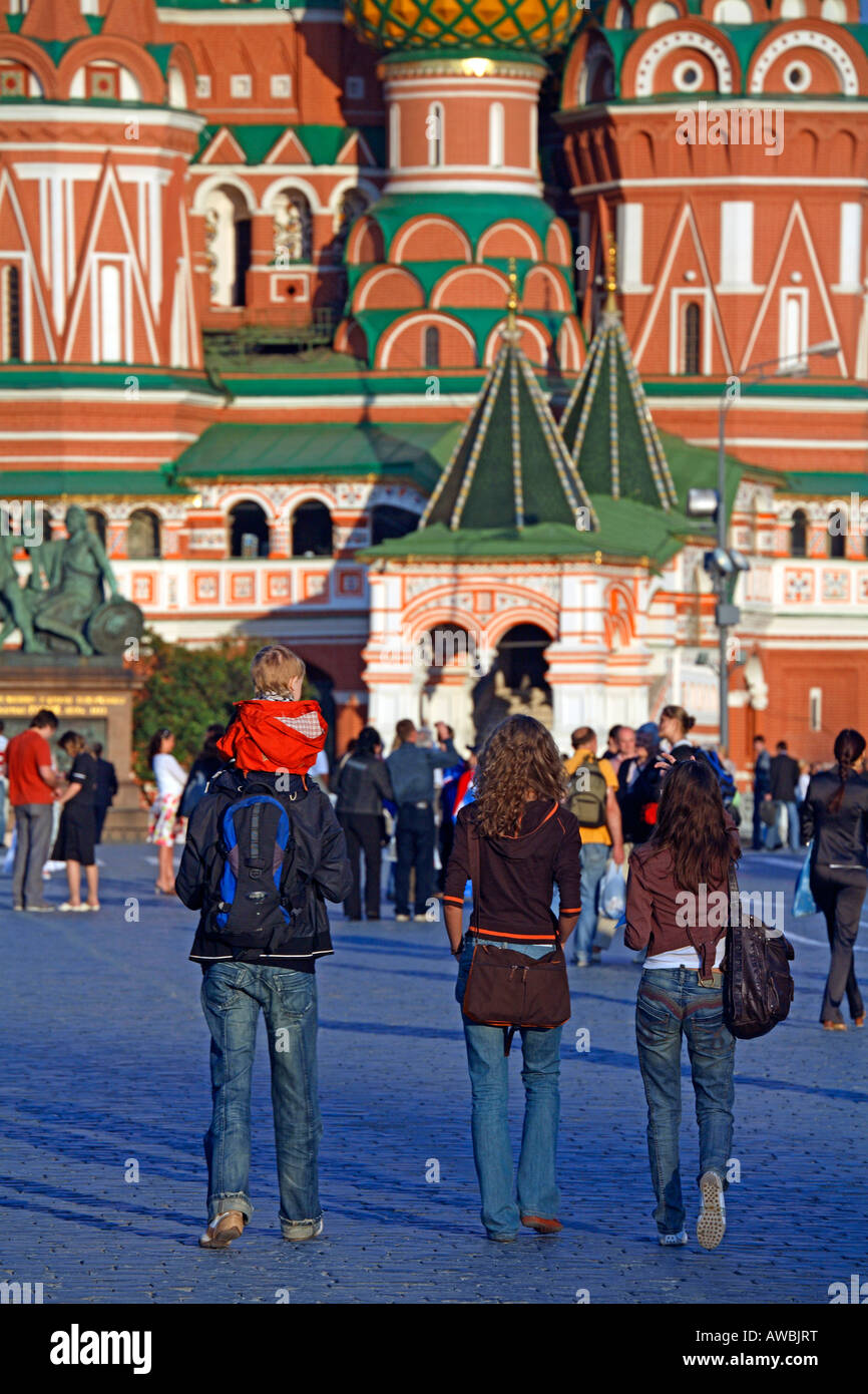Women walking red square hi-res stock photography and images - Alamy