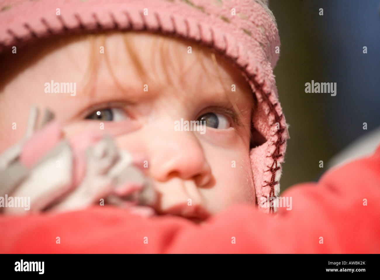 Baby girl wrapped up warm for winter Stock Photo - Alamy