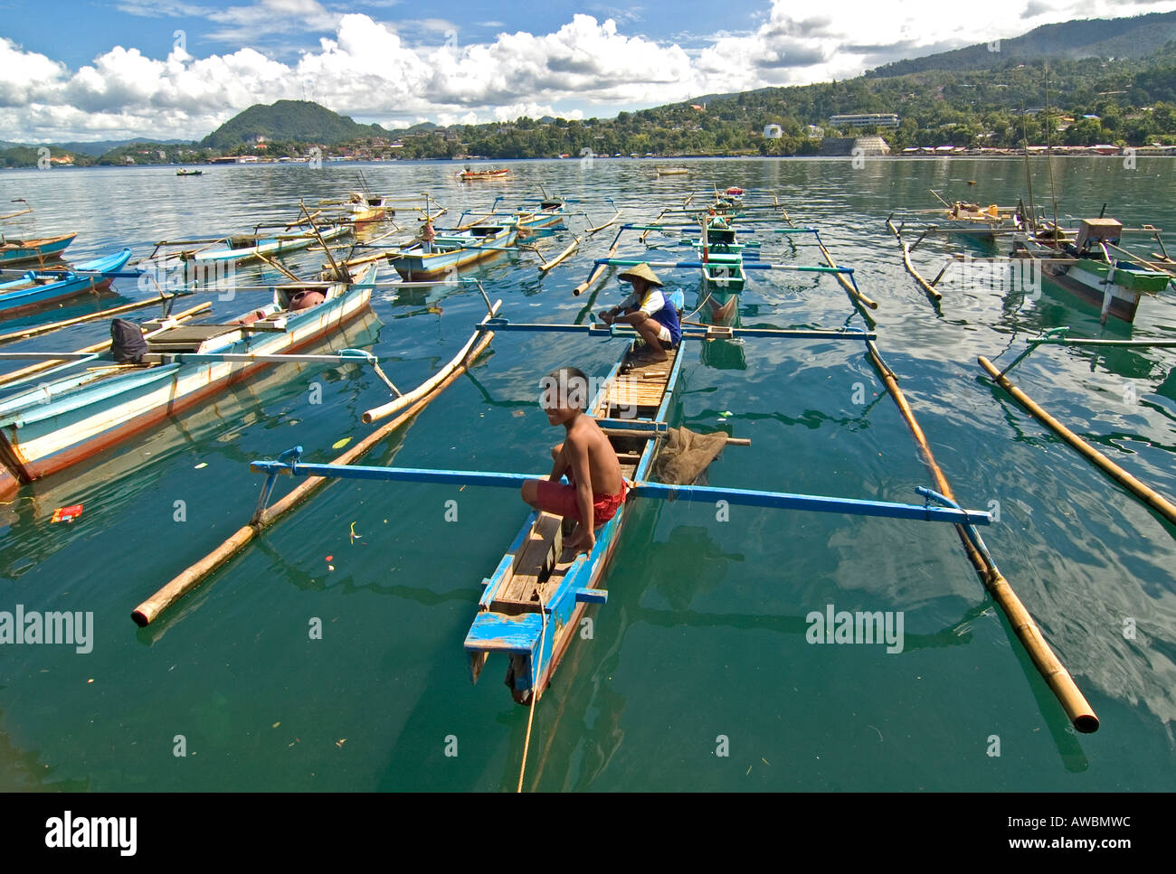 A traditional Papuan boat. Photo taken in Jayapura's Dock 9 area, West ...