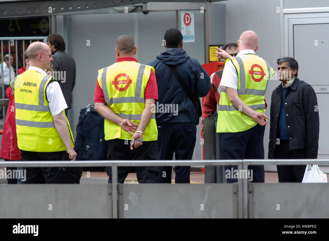 london transport Workers with Passengers at the Victoria Bus station ...