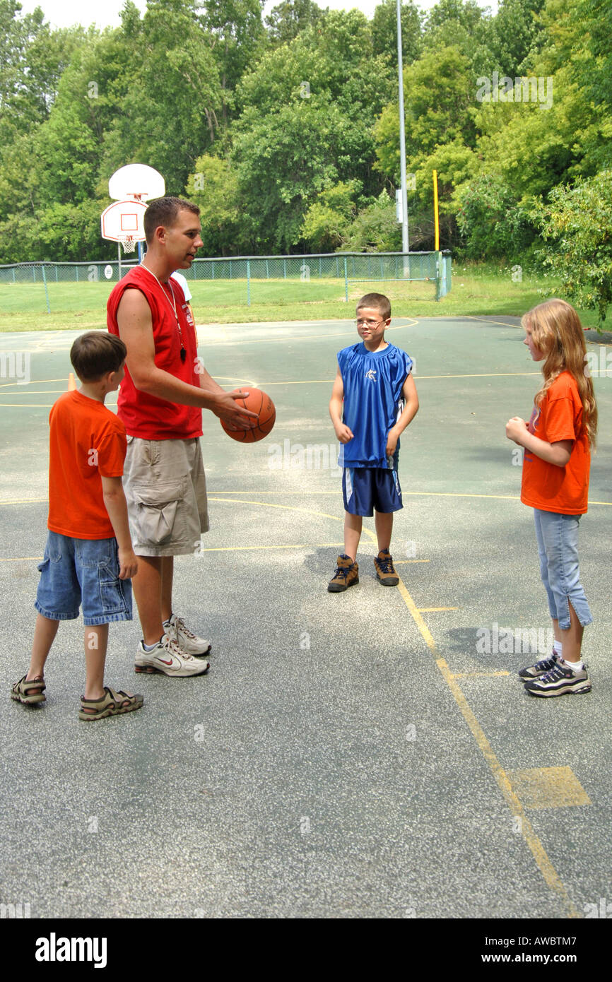 Boy girl bouncing ball hi-res stock photography and images - Alamy