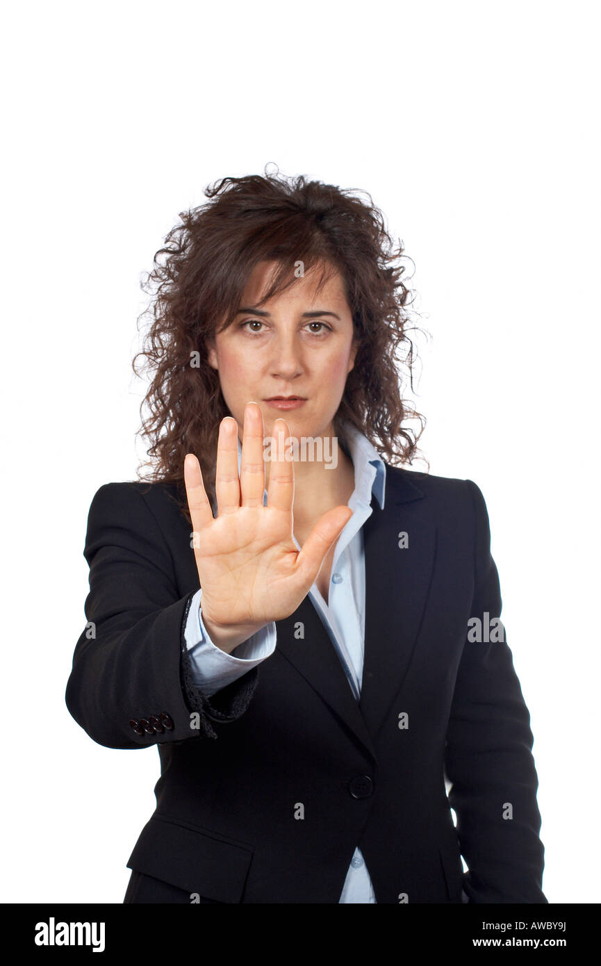 Serious business woman saying stop over a white background Hand on ...