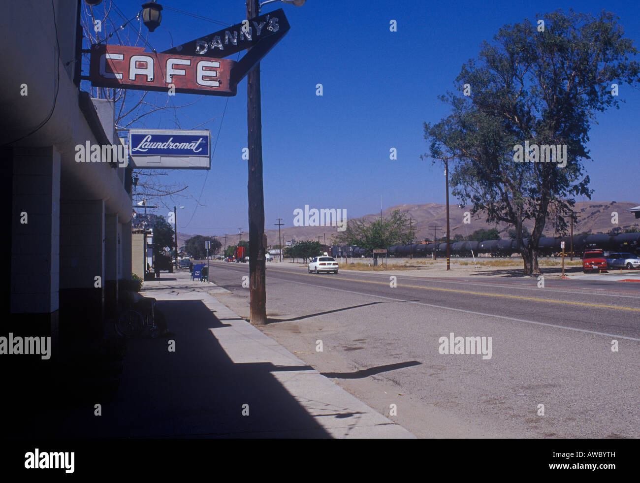 Empty Main Street on low rise strip in San Miguel California. Sign for ...