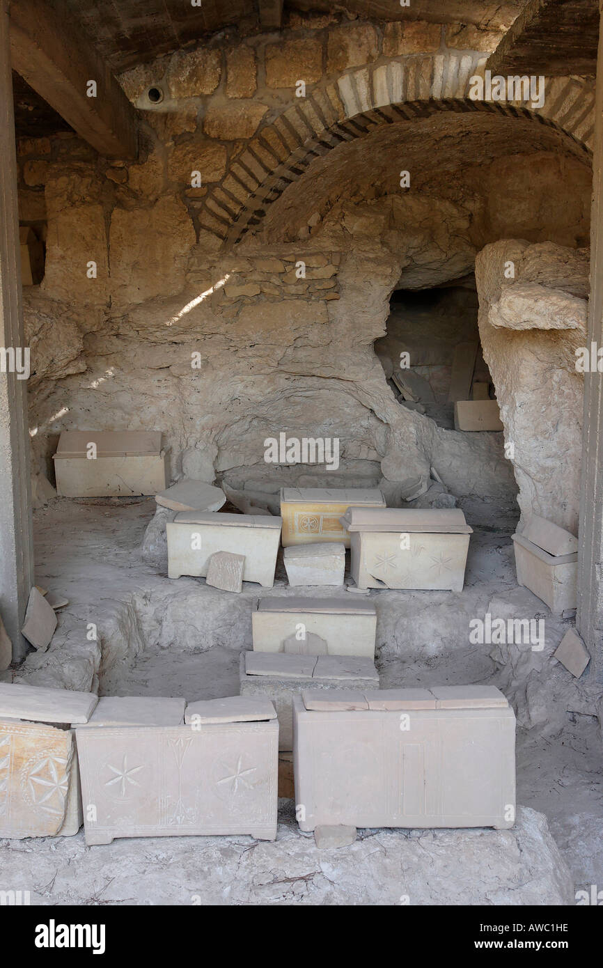 Israel Jerusalem Carved stone ossuaries at a burial site in the yard of ...