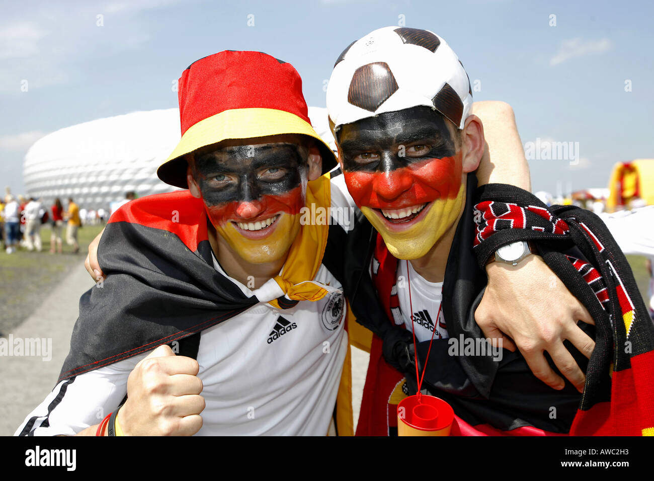 Two German fans wearing face paint and hats on the streets during the ...