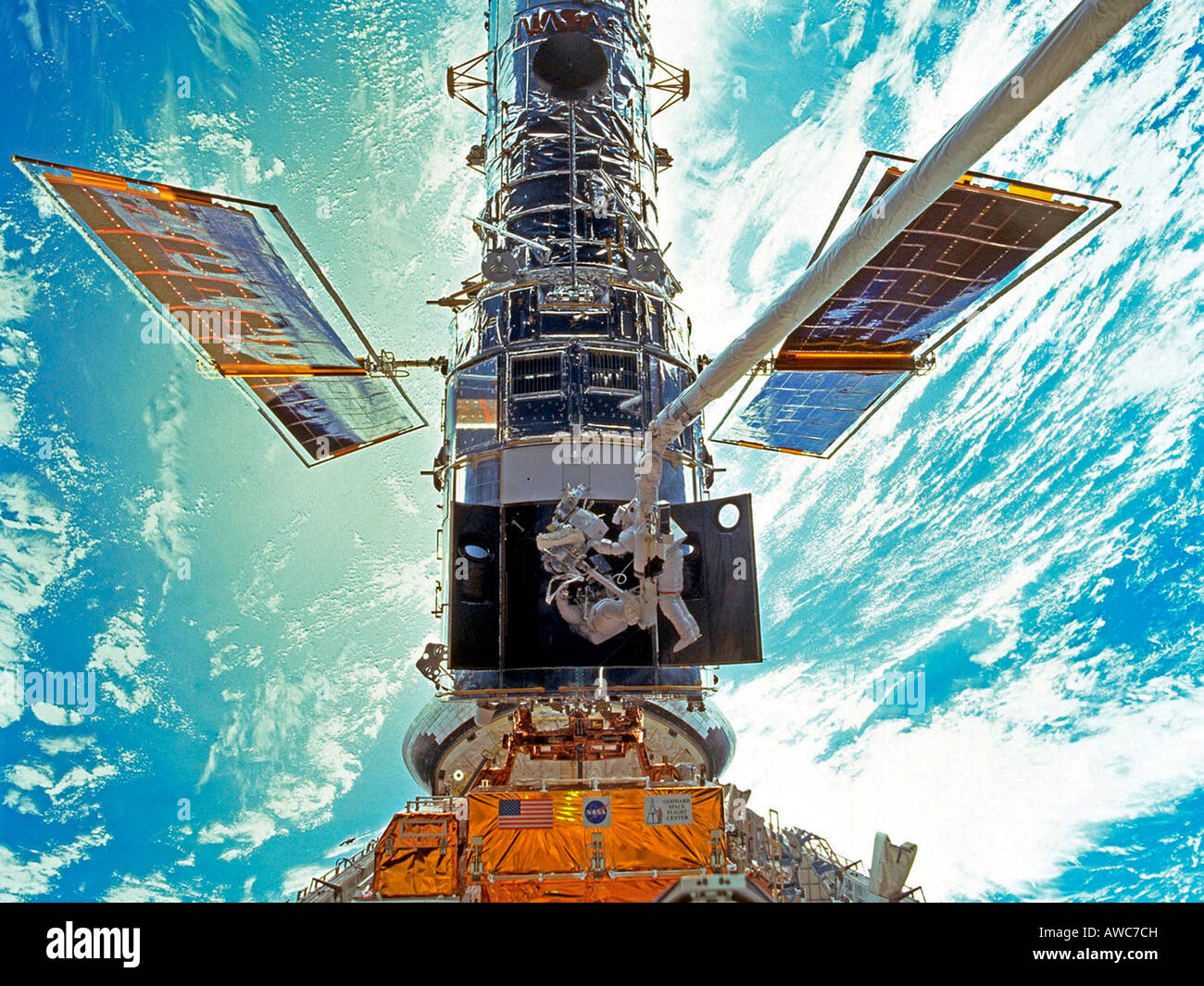 astronauts working on Hubble Telescope in space Stock Photo - Alamy