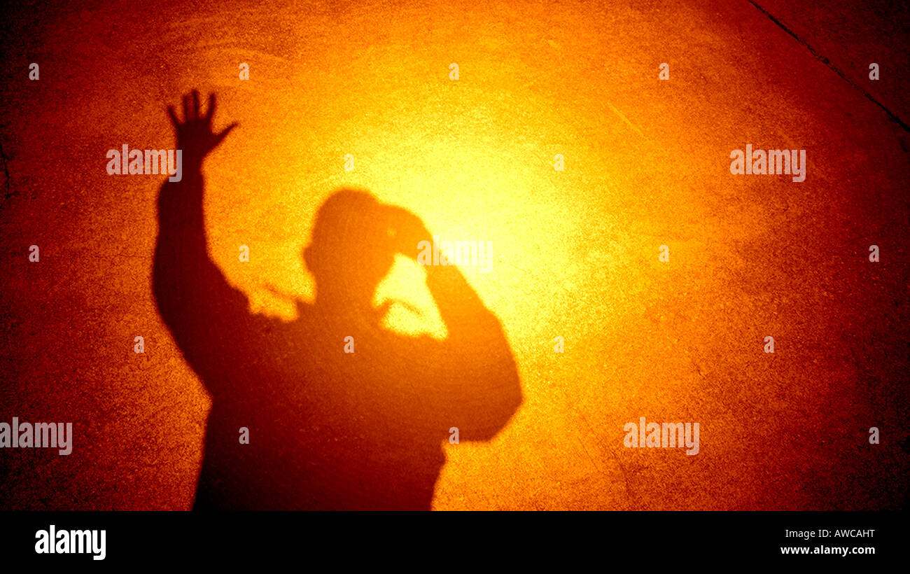 shadow of man taking his own photo Stock Photo - Alamy