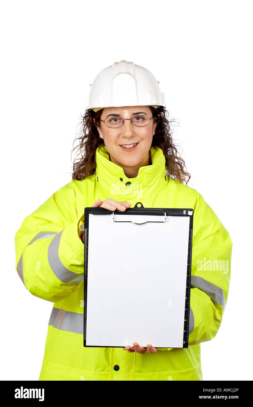 Female construction worker showing a blank sheet over a white ...