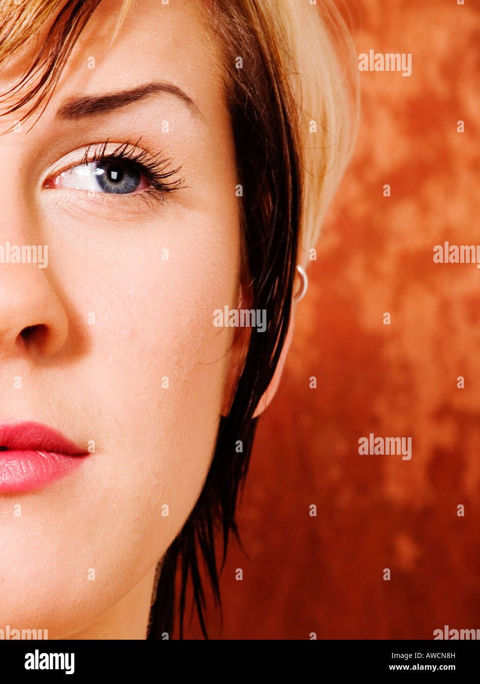 Young woman looking serious, portrait Stock Photo - Alamy