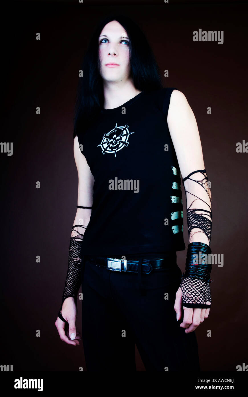 Goth-style: young, dark-haired man standing Stock Photo - Alamy