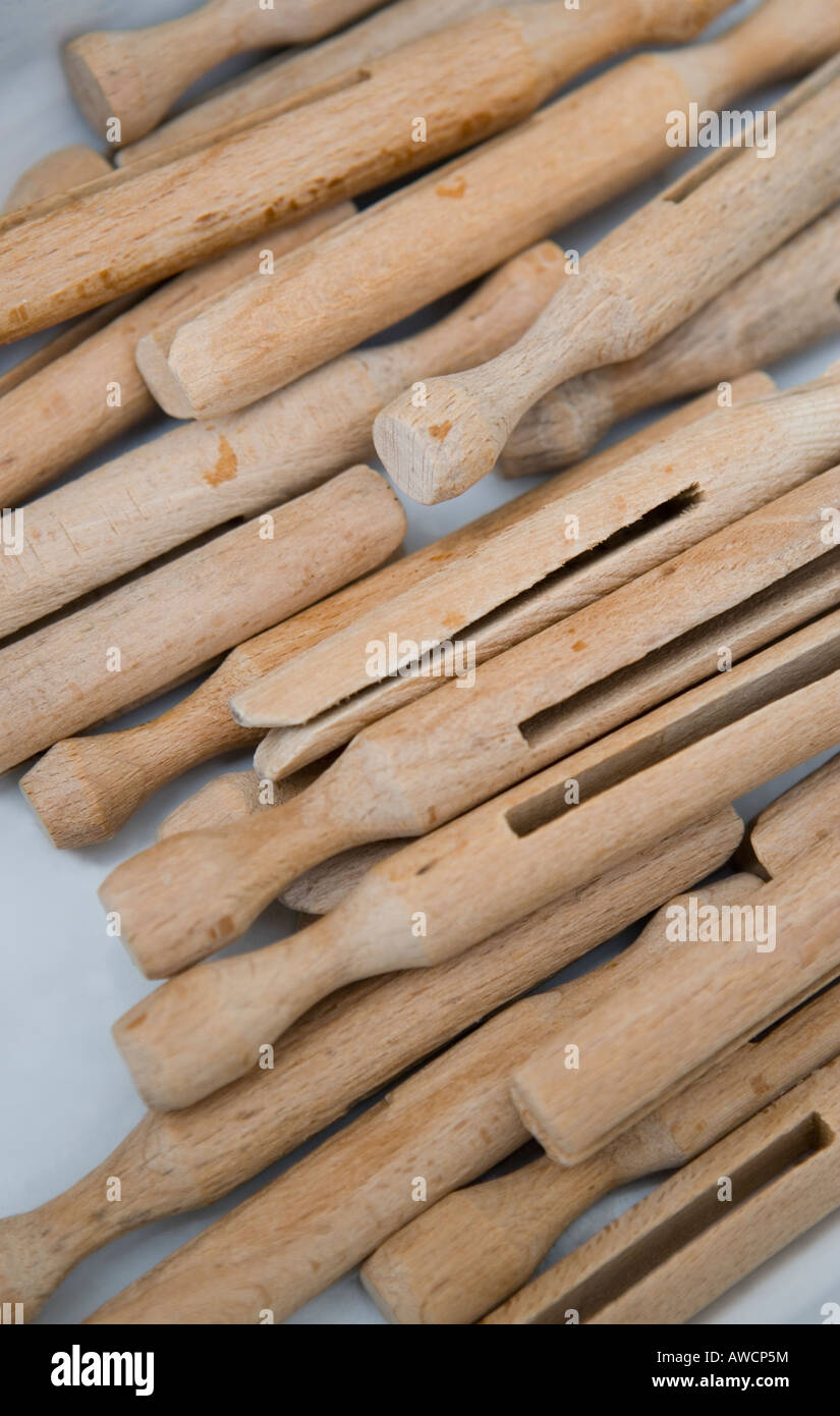 Traditional shape wooden pegs Stock Photo - Alamy