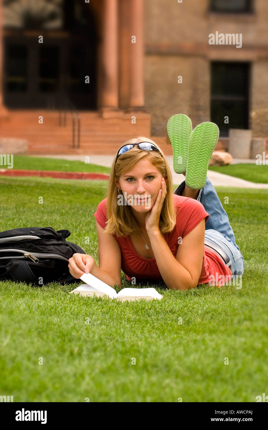 Young blonde female college student studying on campus Stock Photo - Alamy