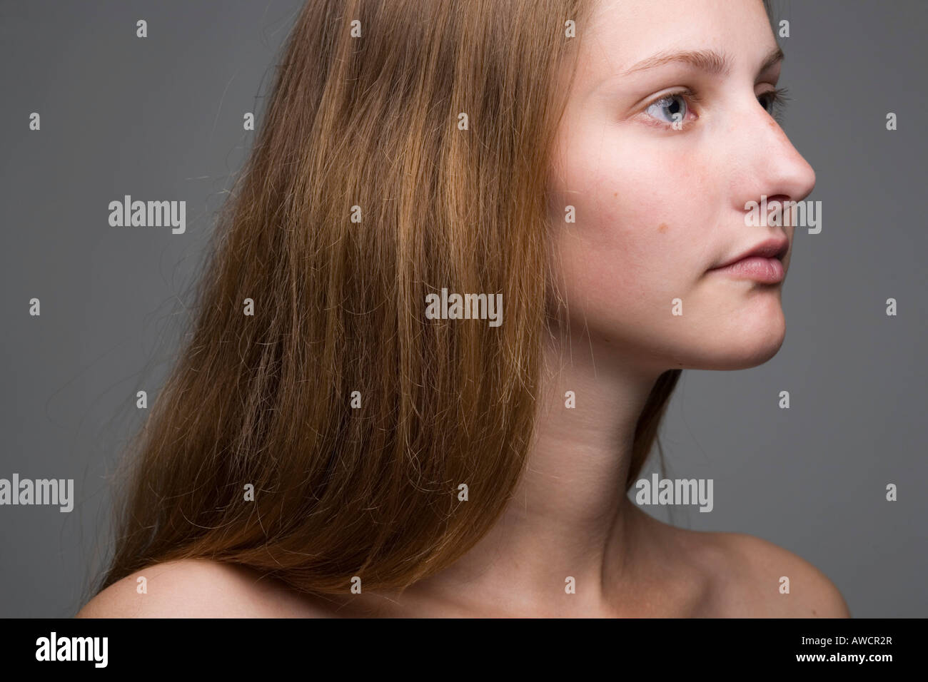 Portrait of long-haired woman, profile Stock Photo - Alamy