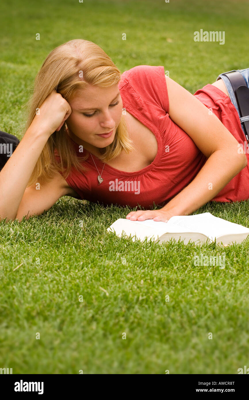 Young blonde female college student studying on campus Stock Photo - Alamy