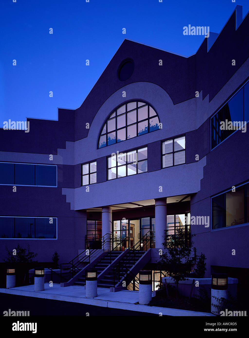 early evening exterior office windows Stock Photo - Alamy