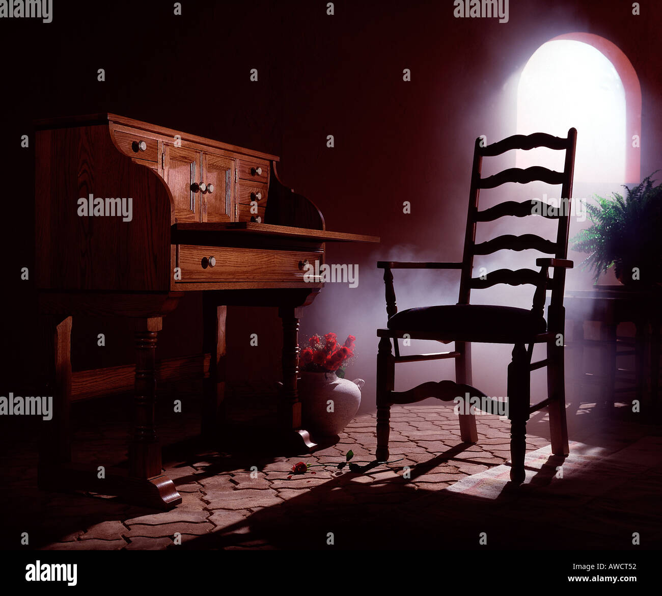 Dramatic interior room furniture desk chair brick floor Stock Photo - Alamy