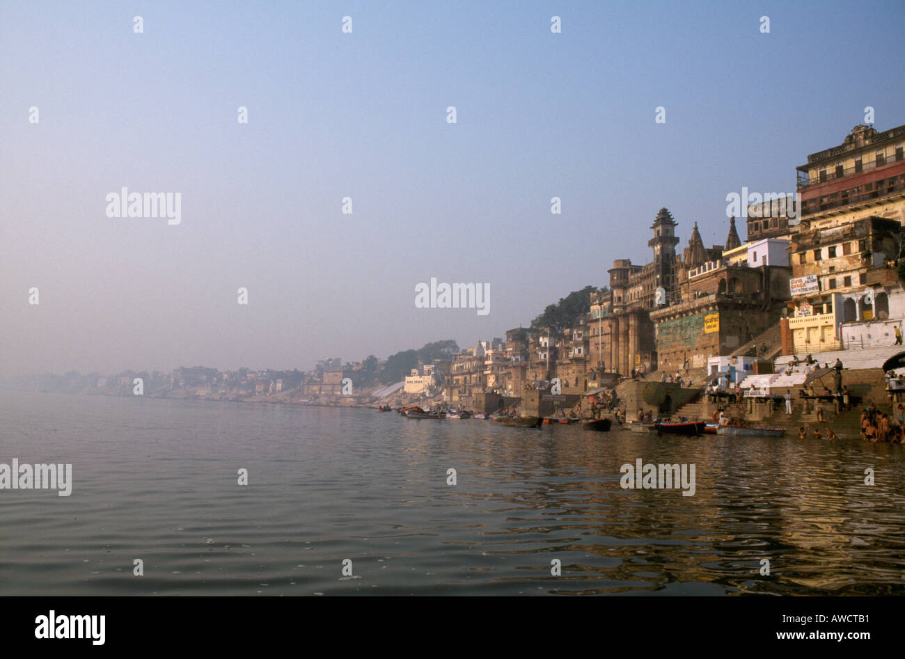 Sunrise view of the ghats along the river Ganges at Varanasi in India ...