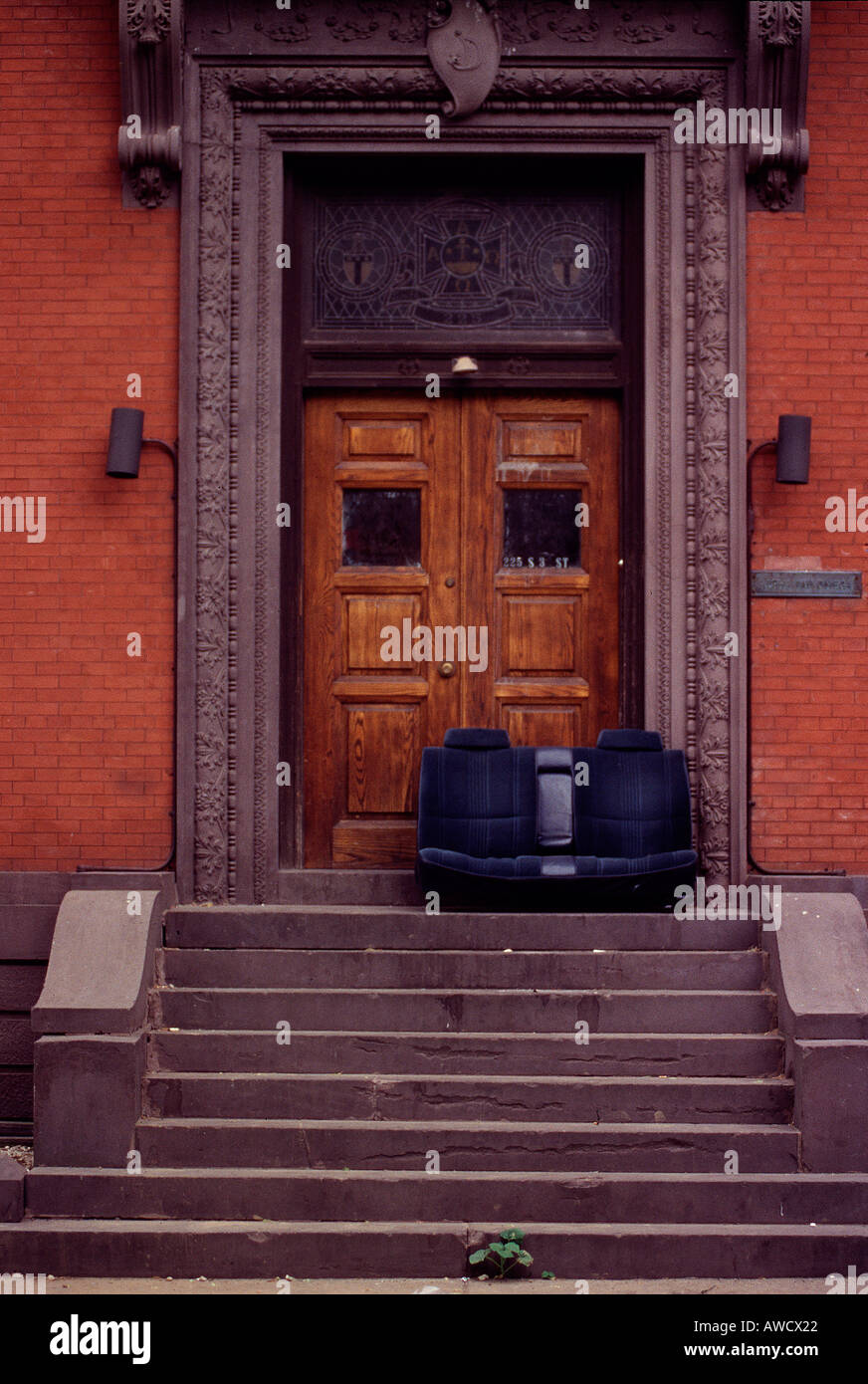 two automobile chair seats on steps of fraternity house University of ...