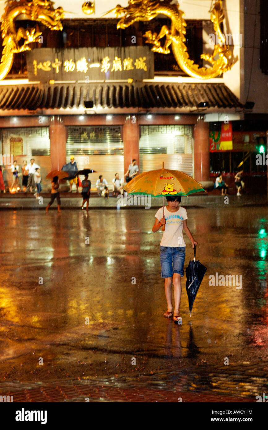 Asian girl garden rain hi-res stock photography and images - Alamy