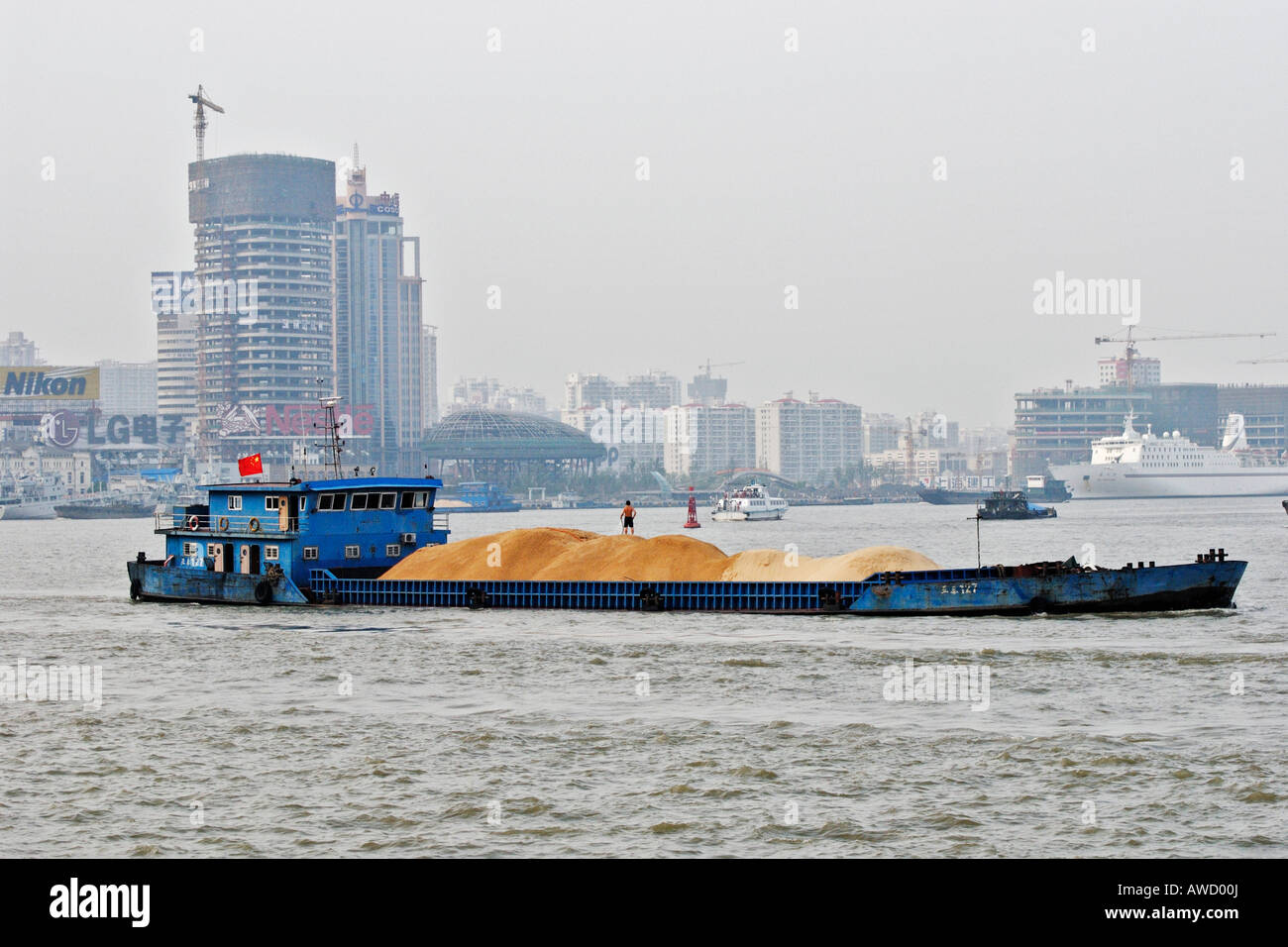 Barge in the Huangpu river in front of Pudong, Shanghai, China, Asia ...