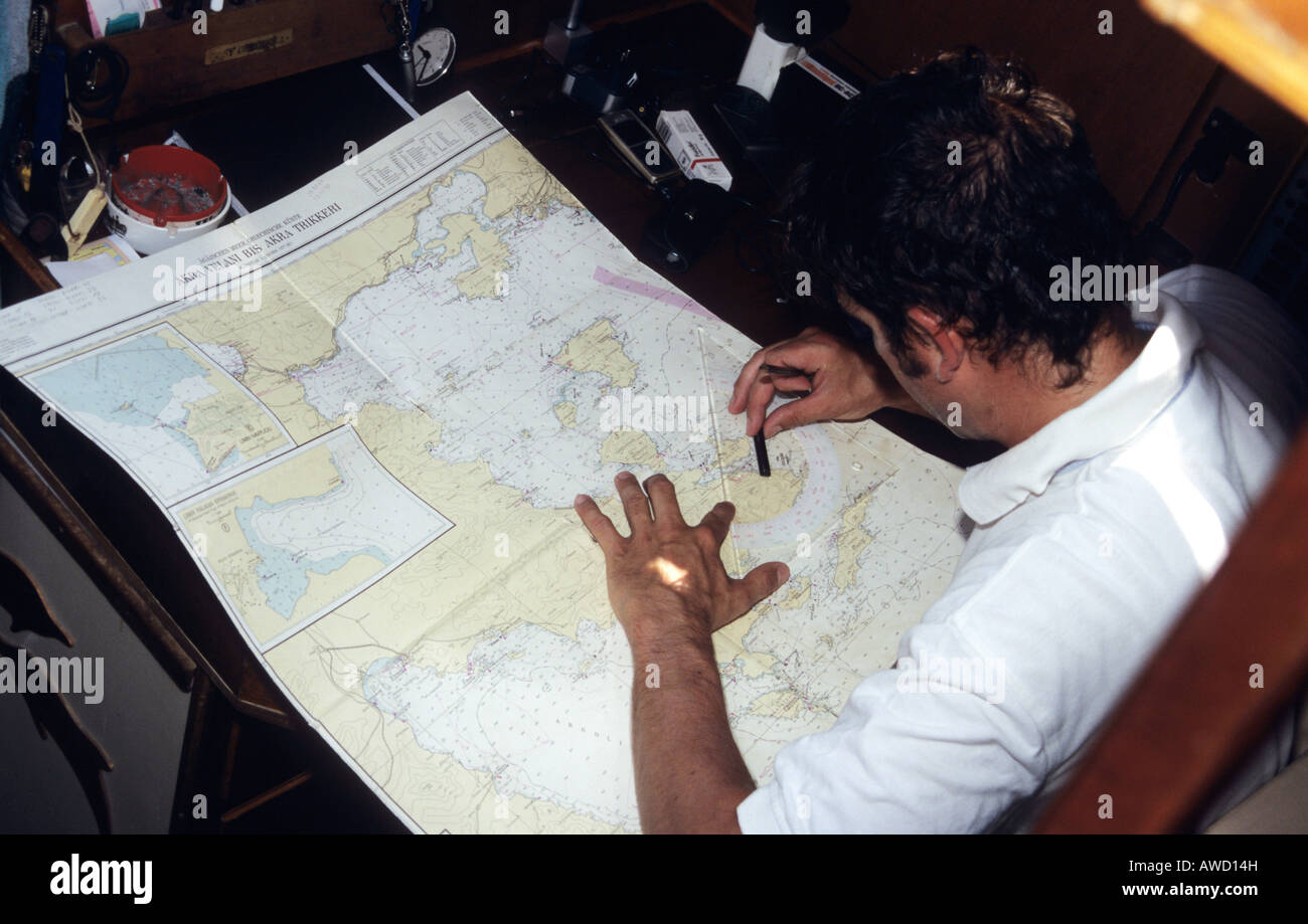 Man navigating, sailing Stock Photo - Alamy
