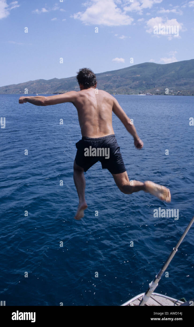 Man jumping into the sea, Greece, Europe Stock Photo - Alamy