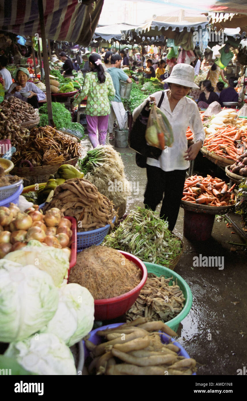 Woman Walking Through Market Stock Photo - Alamy