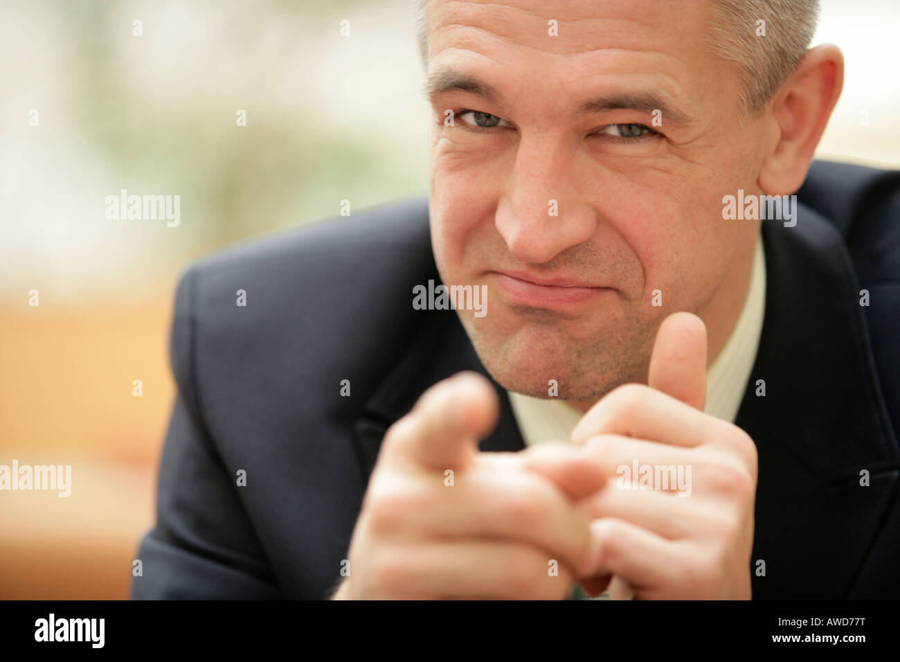Old businessman pointing camera in hi-res stock photography and images ...