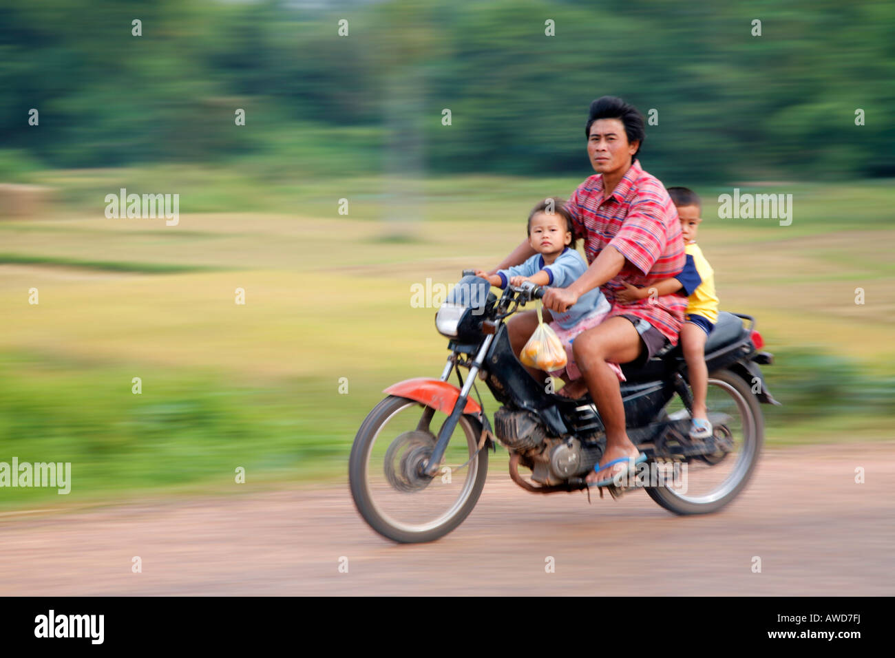 Laos family on motorcycle in hi-res stock photography and images - Alamy
