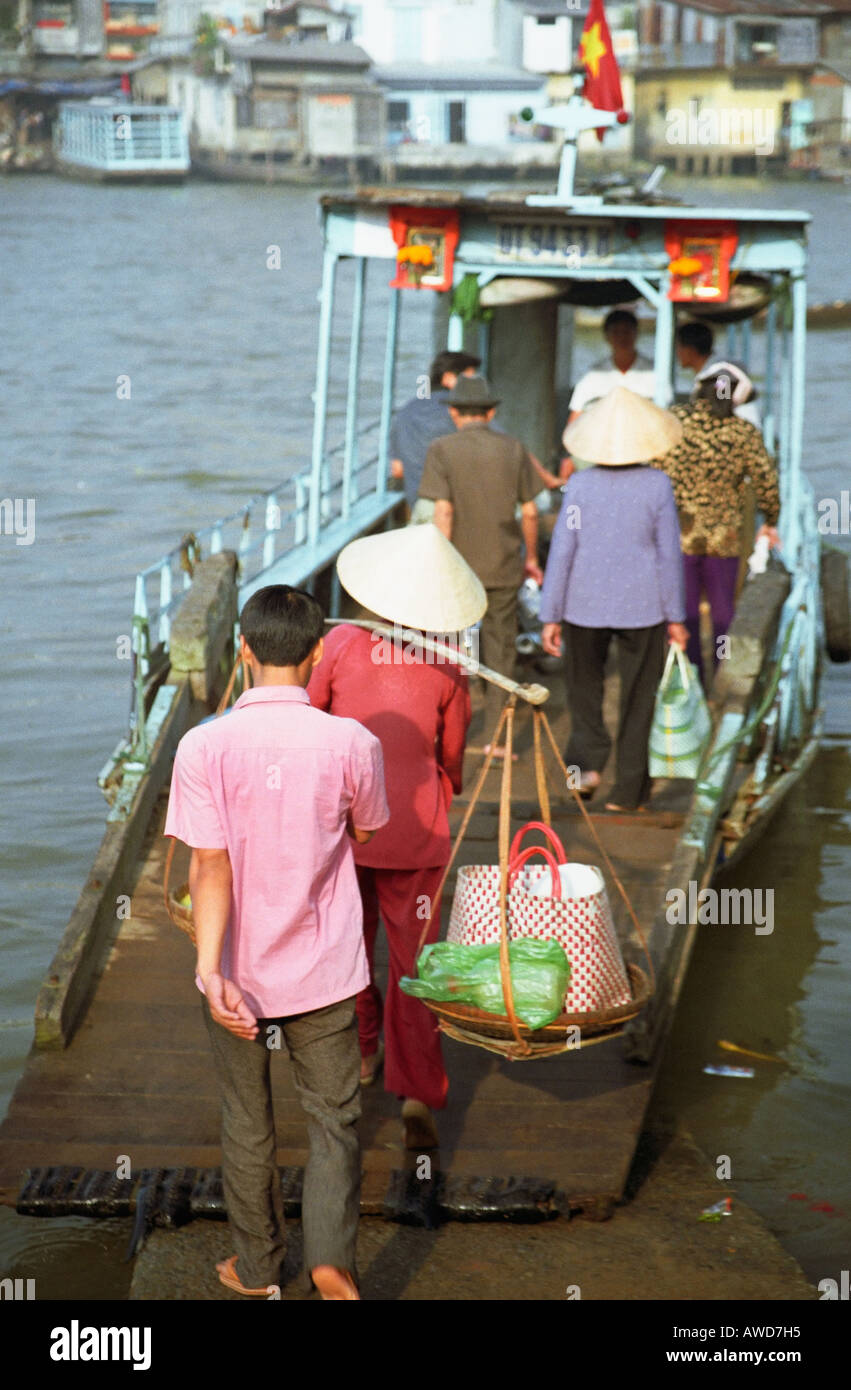 People Boarding A Passenger Ferry, Vietnam Stock Photo - Alamy