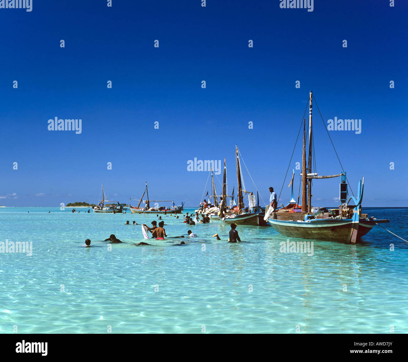Tour boats, snorkeling in lagoon, Maldives, Indian Ocean Stock Photo ...