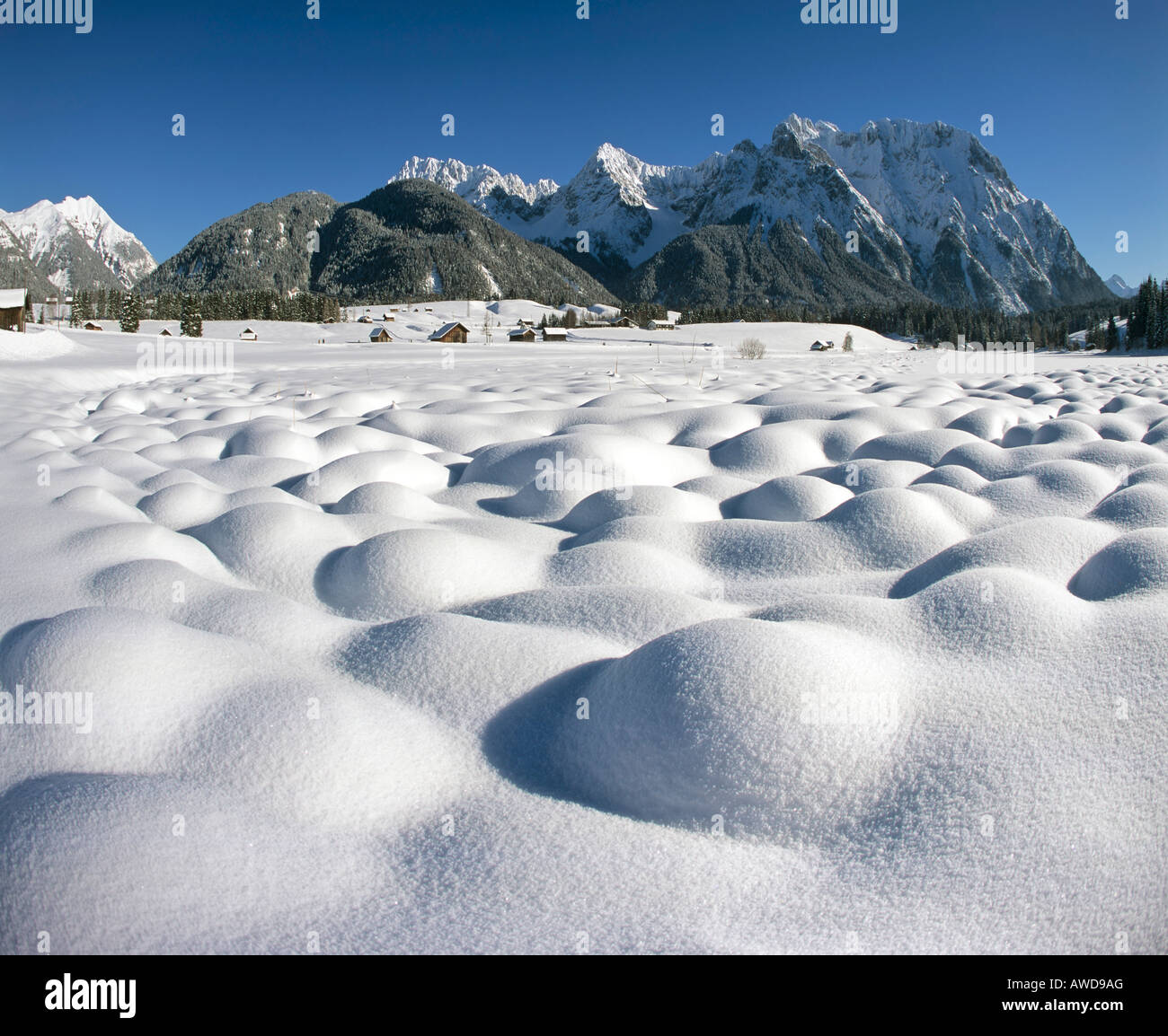 Winter landscape with snow mounds at the Schmalensee, Mittenwald ...