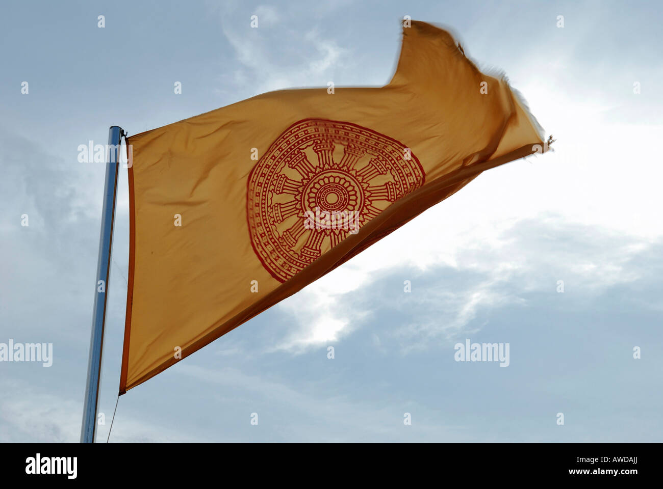Buddhist flag with the wheel Dharmacakra or Dharmachakra, symbol for ...