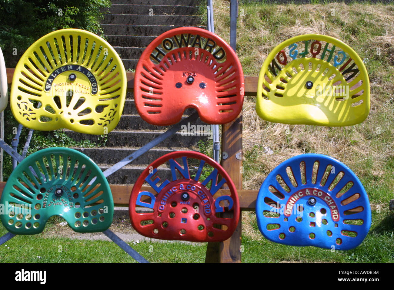 Vintage tractor seat colourful Stock Photo - Alamy