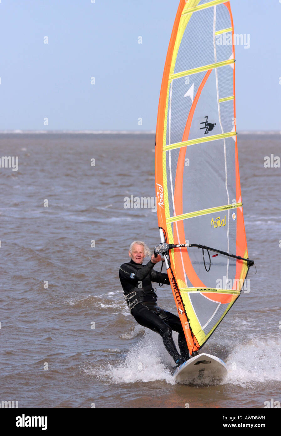man with grey hair windsurfing Stock Photo - Alamy